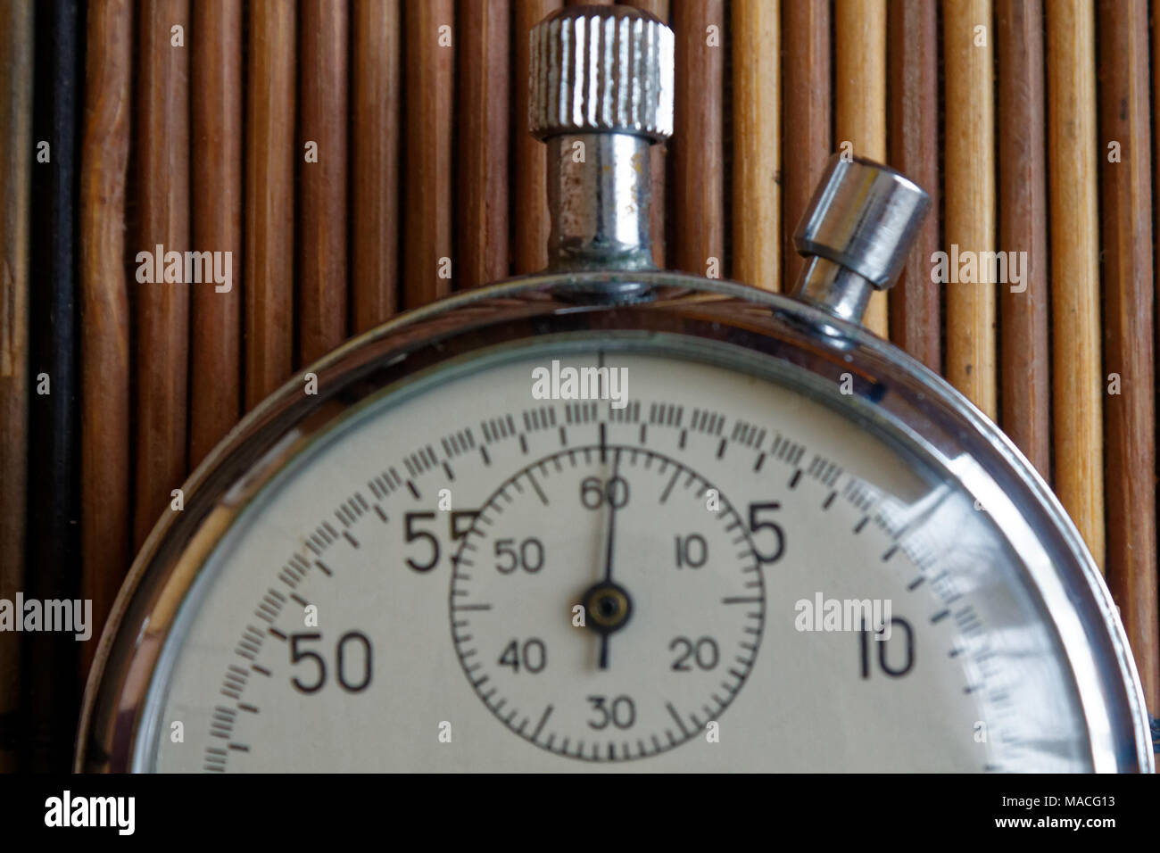 Vintage antiques Stopwatch, retro on wooden background, value measure ...