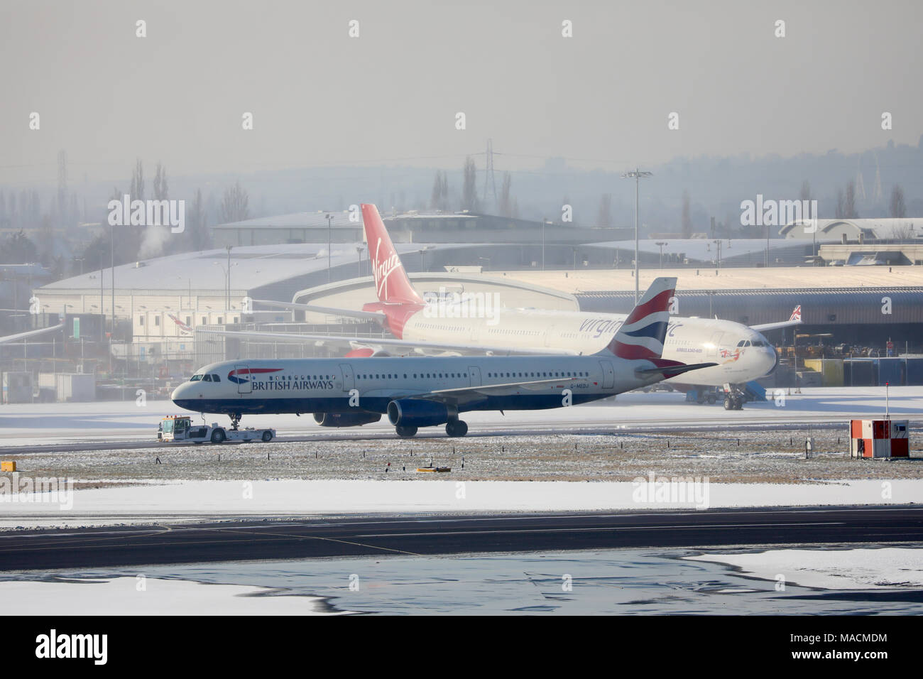 Heavy snow covers Heathrow Airport Featuring: Atmosphere Where: London ...