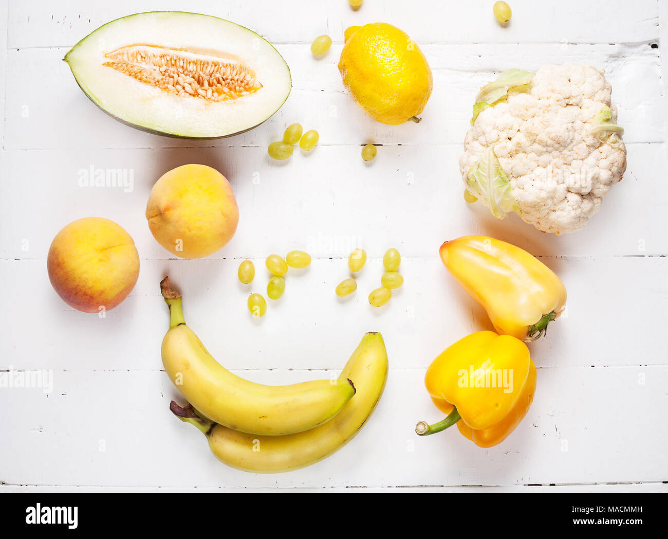 selection of various fresh yellow raw organic produce fruits and ...