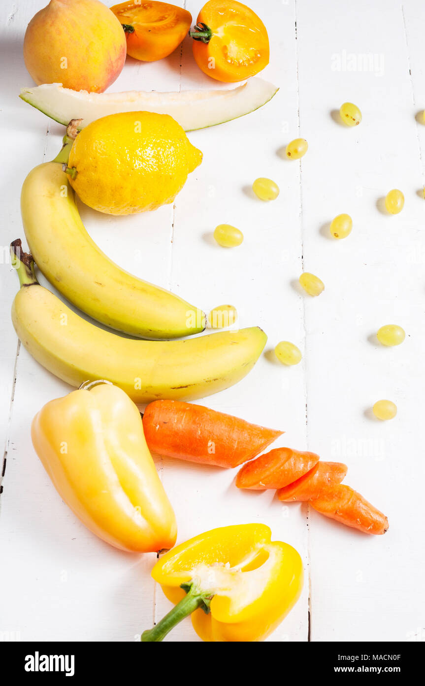 selection of various fresh yellow raw organic produce fruits and ...