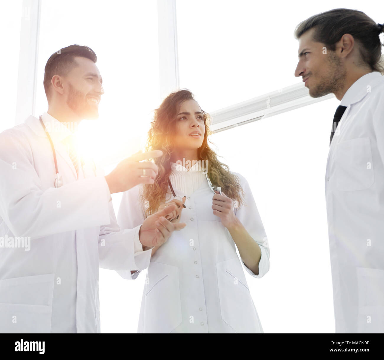 group of doctors discussing in hospital Stock Photo - Alamy