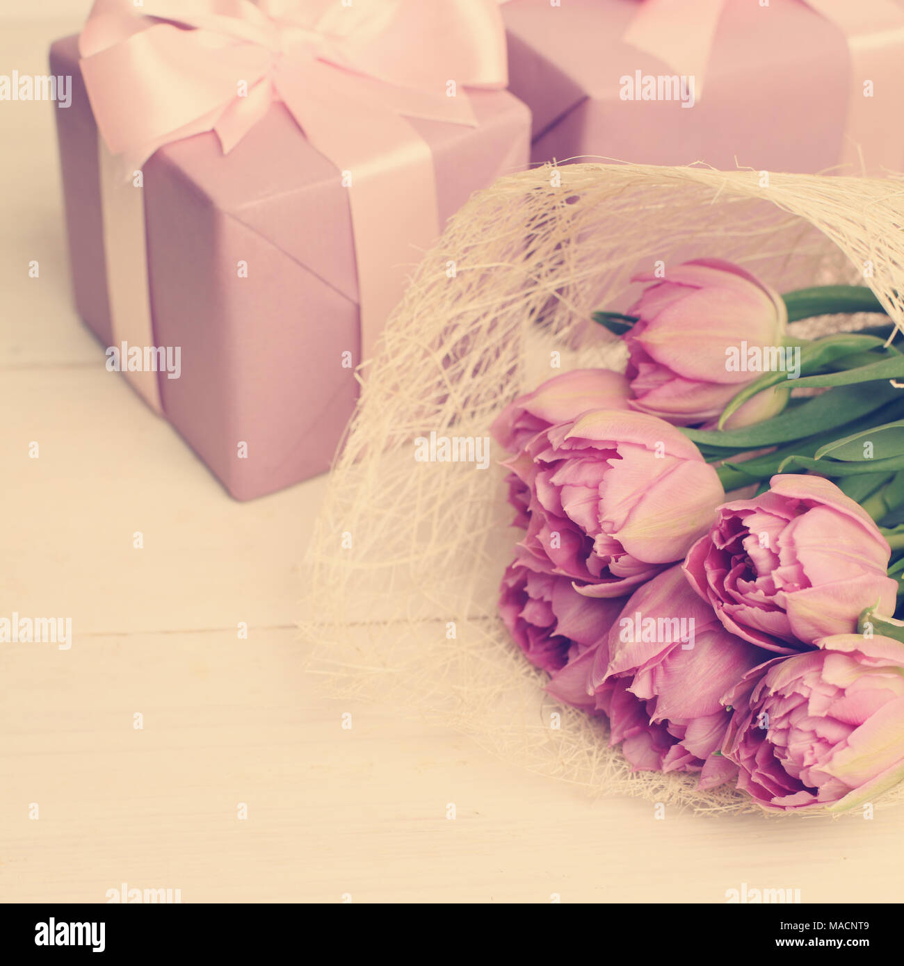 Floral background with flowers and gift Stock Photo - Alamy