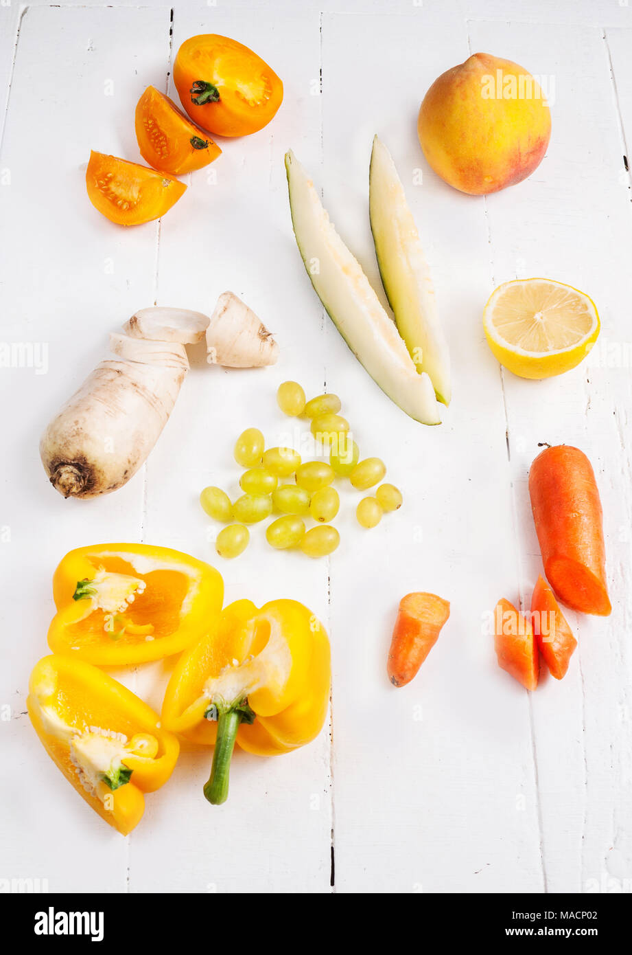 selection of various fresh yellow raw organic produce fruits and ...