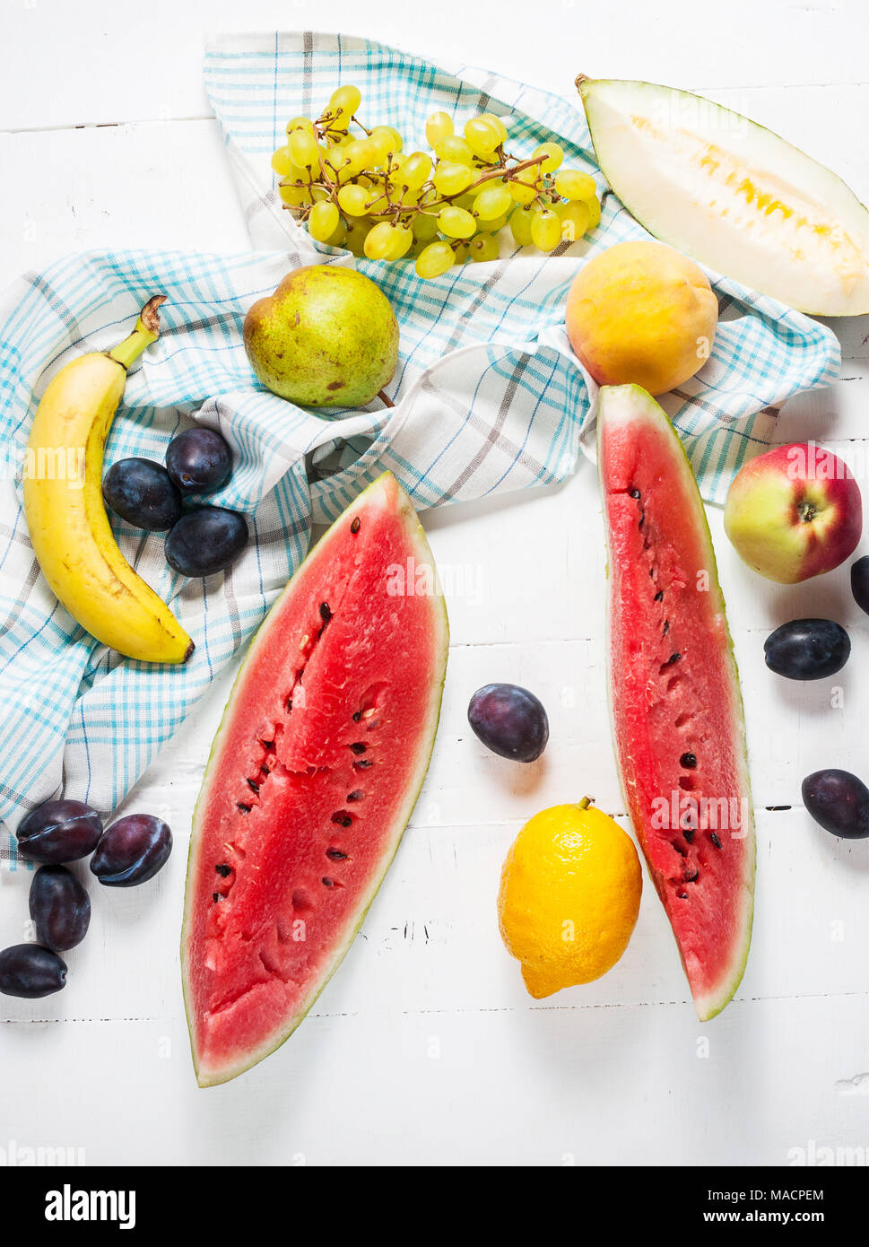 Colorful various of organic farm fruits on wooden rustic background top ...