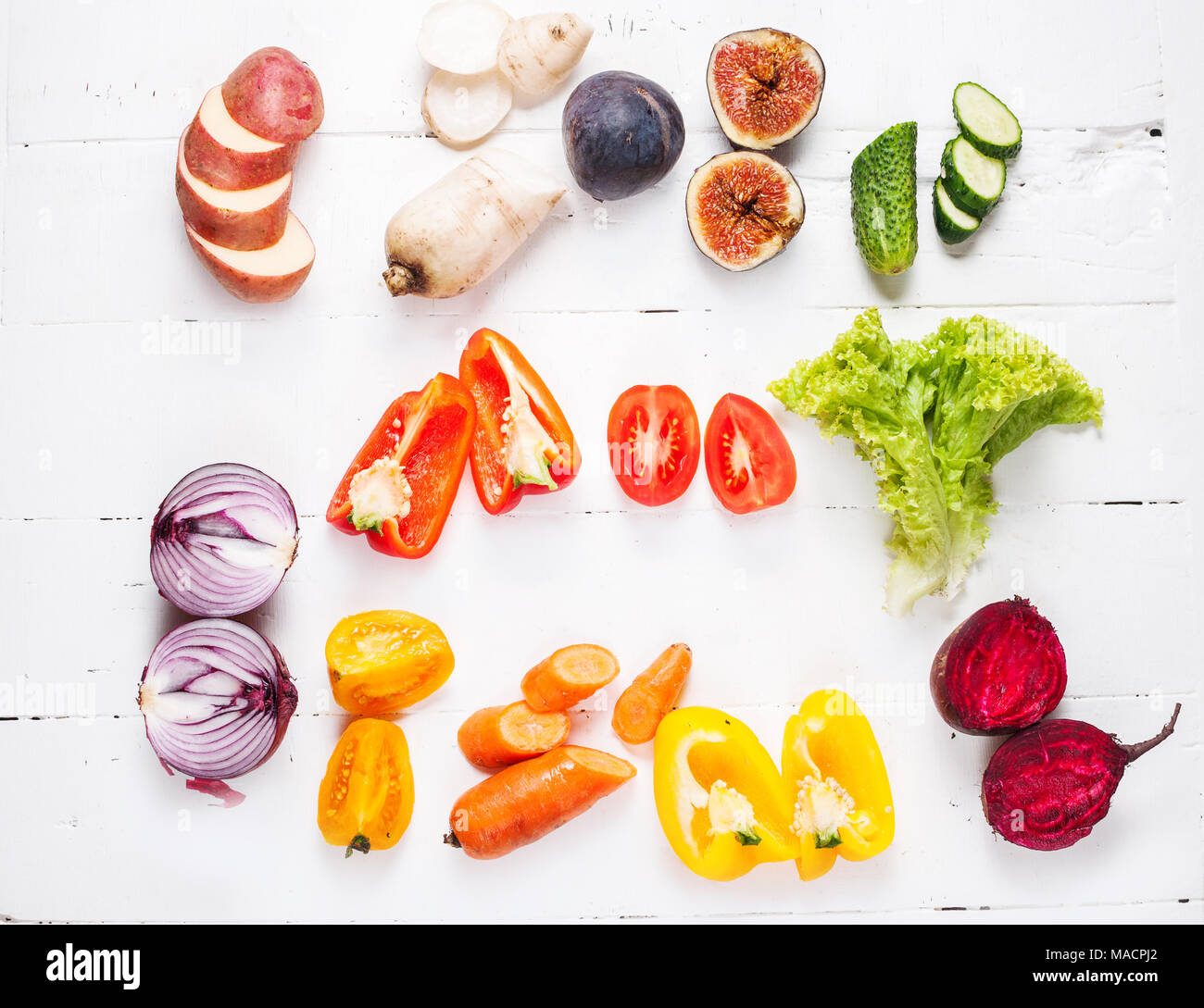 Colorful various of organic farm vegetables on wooden rustic background ...