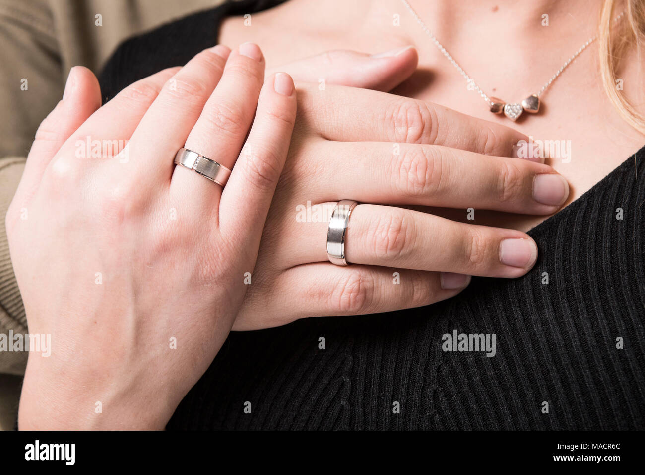 hands with wedding ring Stock Photo - Alamy