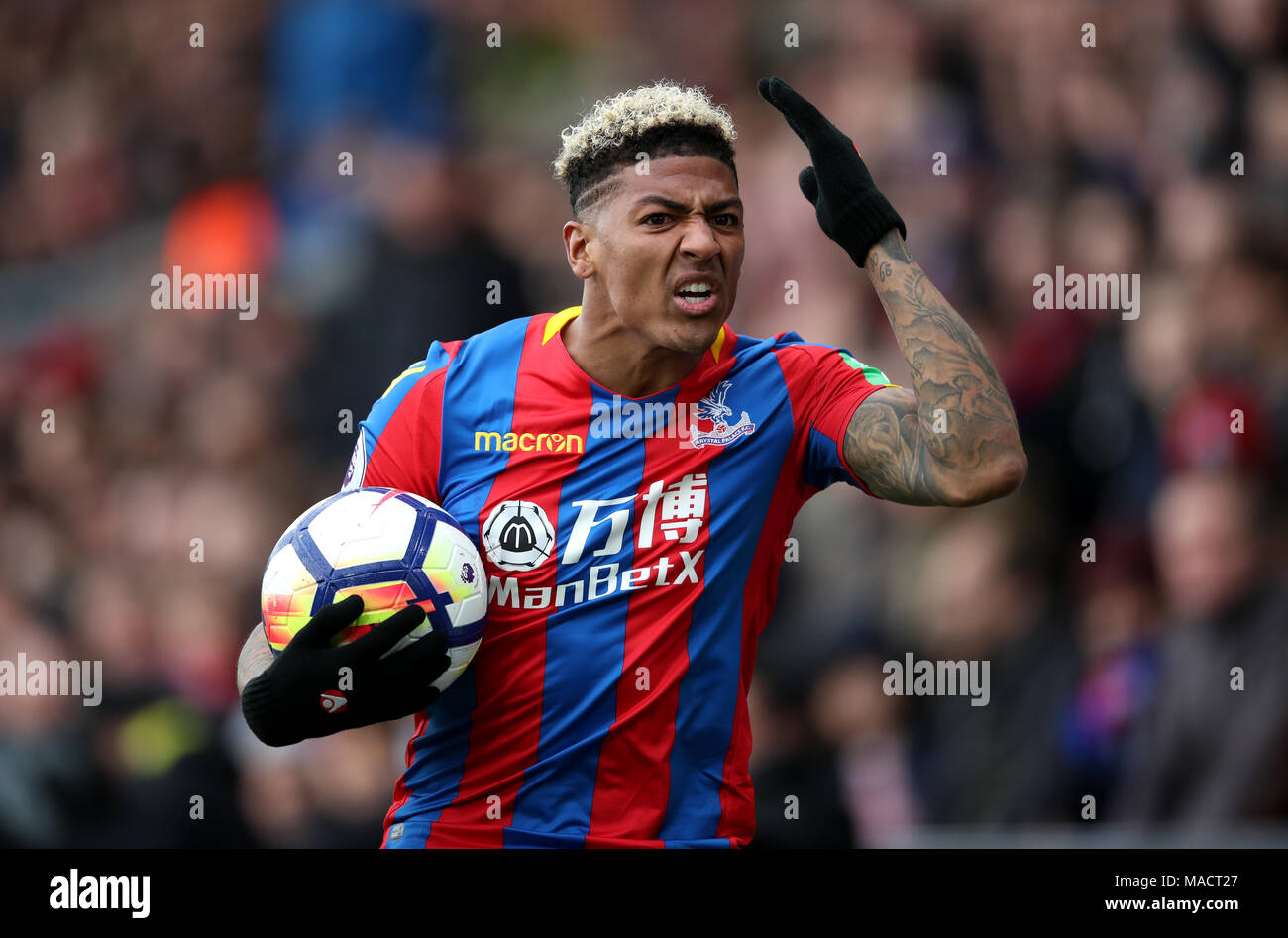 Crystal Palace's Patrick van Aanholt reacts during the Premier League ...