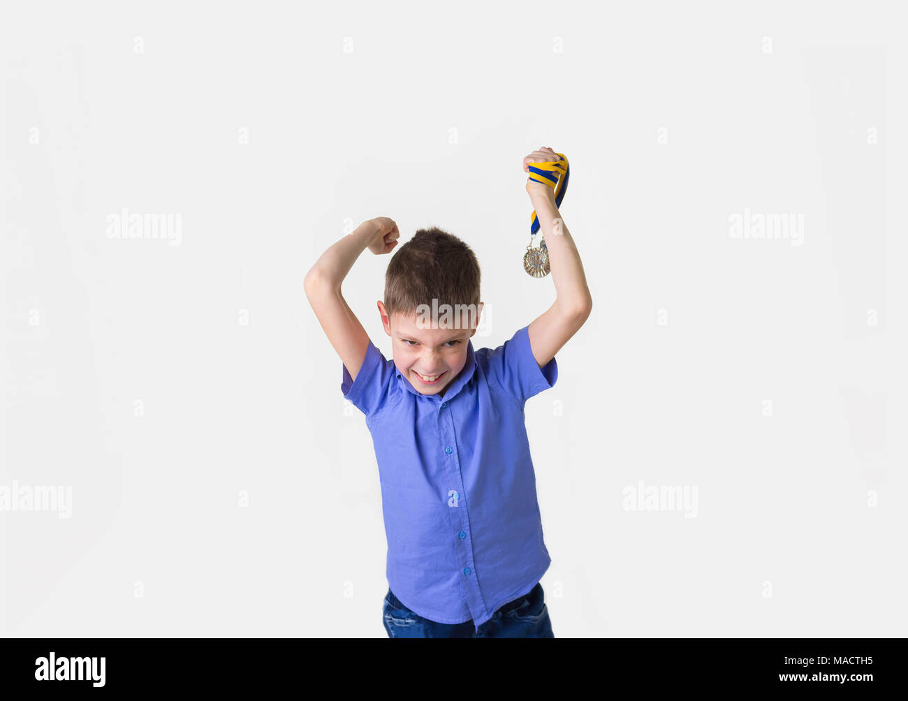 Happy expressive child i with medal isolated on white Stock Photo - Alamy