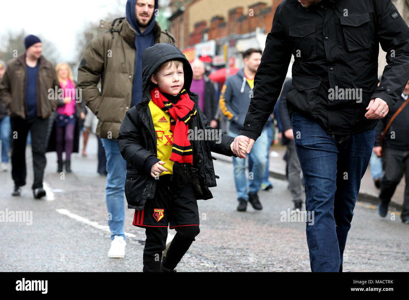 A young Watford fan arrives for the Premier League match at Vicarage ...