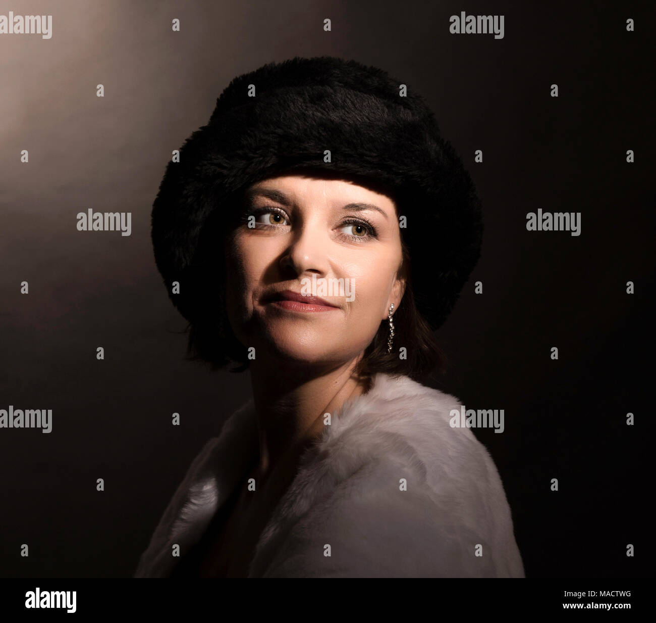 Moody portrait of a beautiful women in the lamplight Stock Photo - Alamy
