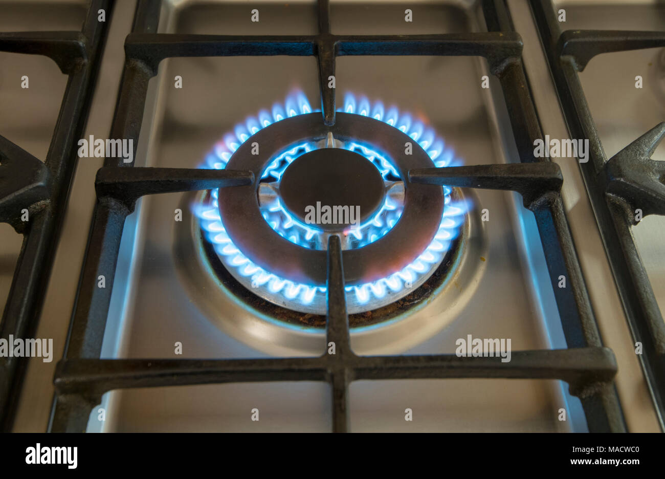 Gas hob burning money hi-res stock photography and images - Alamy