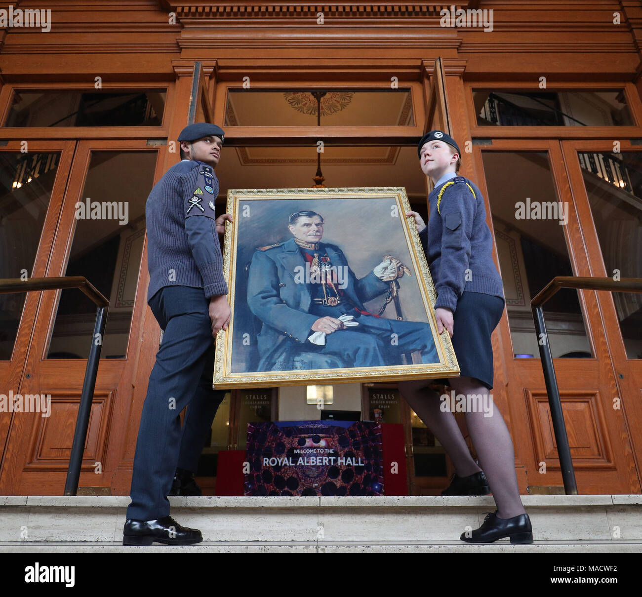 RAF cadets Labib Khan (left) and Jamie Clifford (right) transport a ...