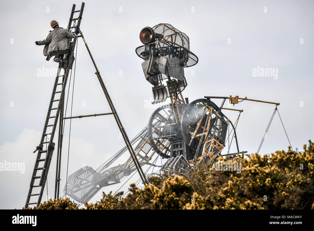 The UK's largest mechanical puppet, The Man Engine, rises up beside the ...