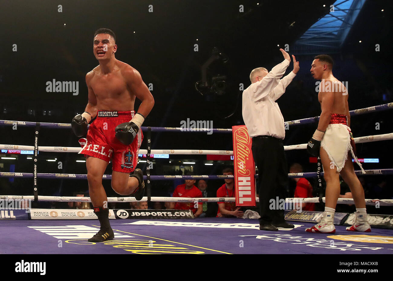 Mose Auimatagi Jr (left) celebrates defeating Morgan Jones in their ...