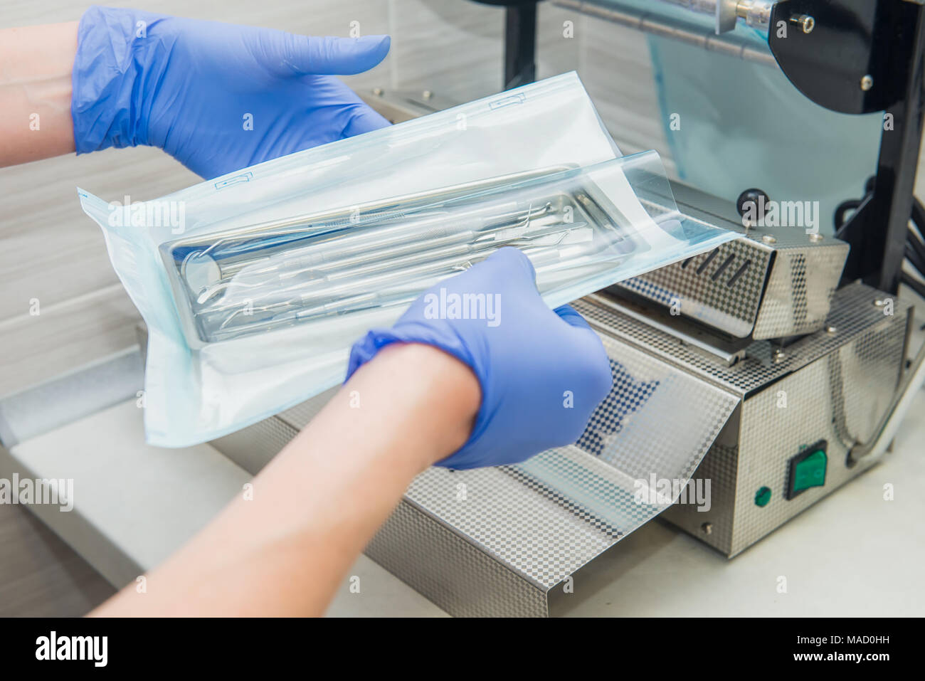 Person using plastic wrap hi-res stock photography and images - Alamy