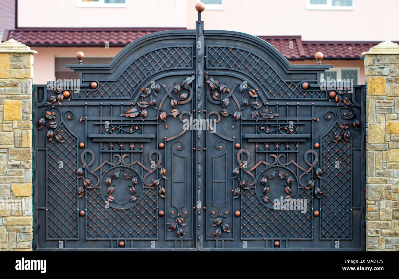 magnificent wrought-iron gates, ornamental forging, forged elements ...