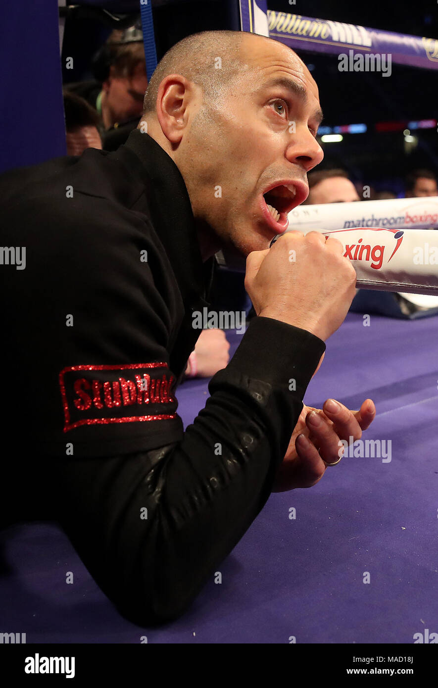 Boxing trainer Adam Booth watches Josh Kelly in action against Carlos ...