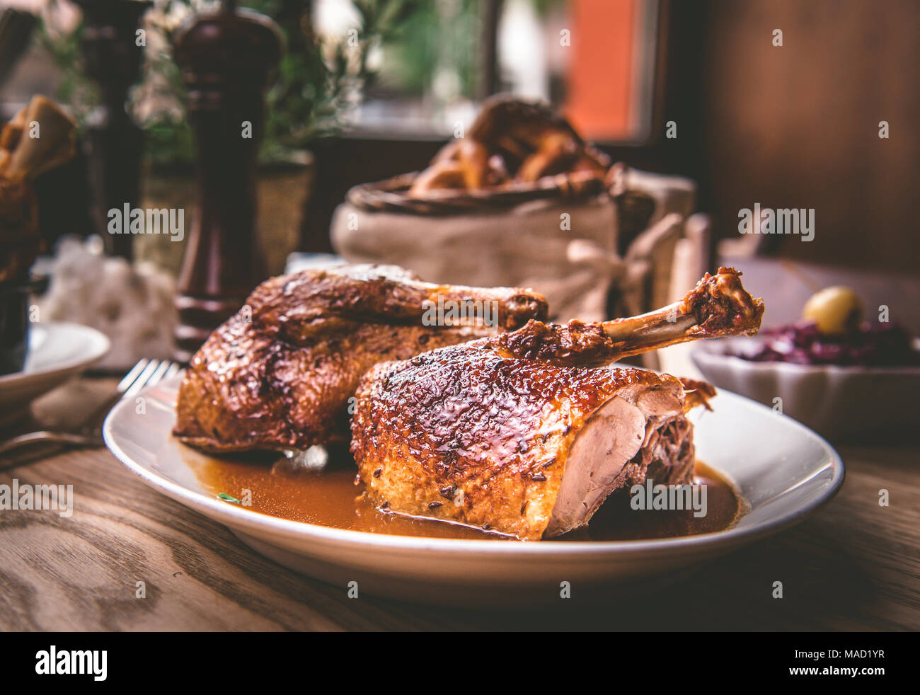 Crispy Grilled Duck with dumpling and red cabbage from the oven. The ...