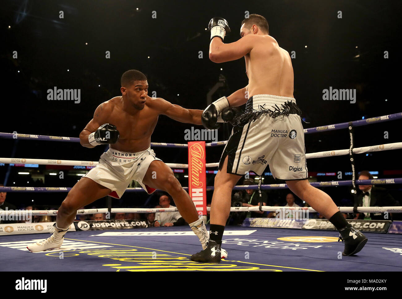 Anthony Joshua (left) in action against Joseph Parker in their WBA, IBF ...