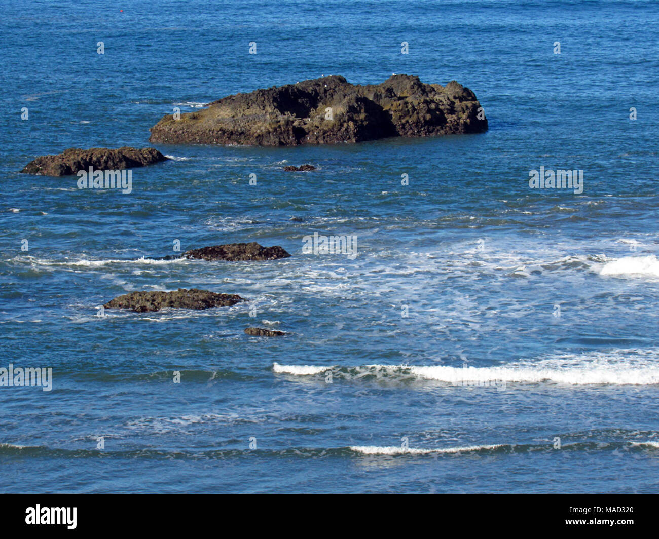 Low Tide at Pacific Coast in OR Stock Photo - Alamy
