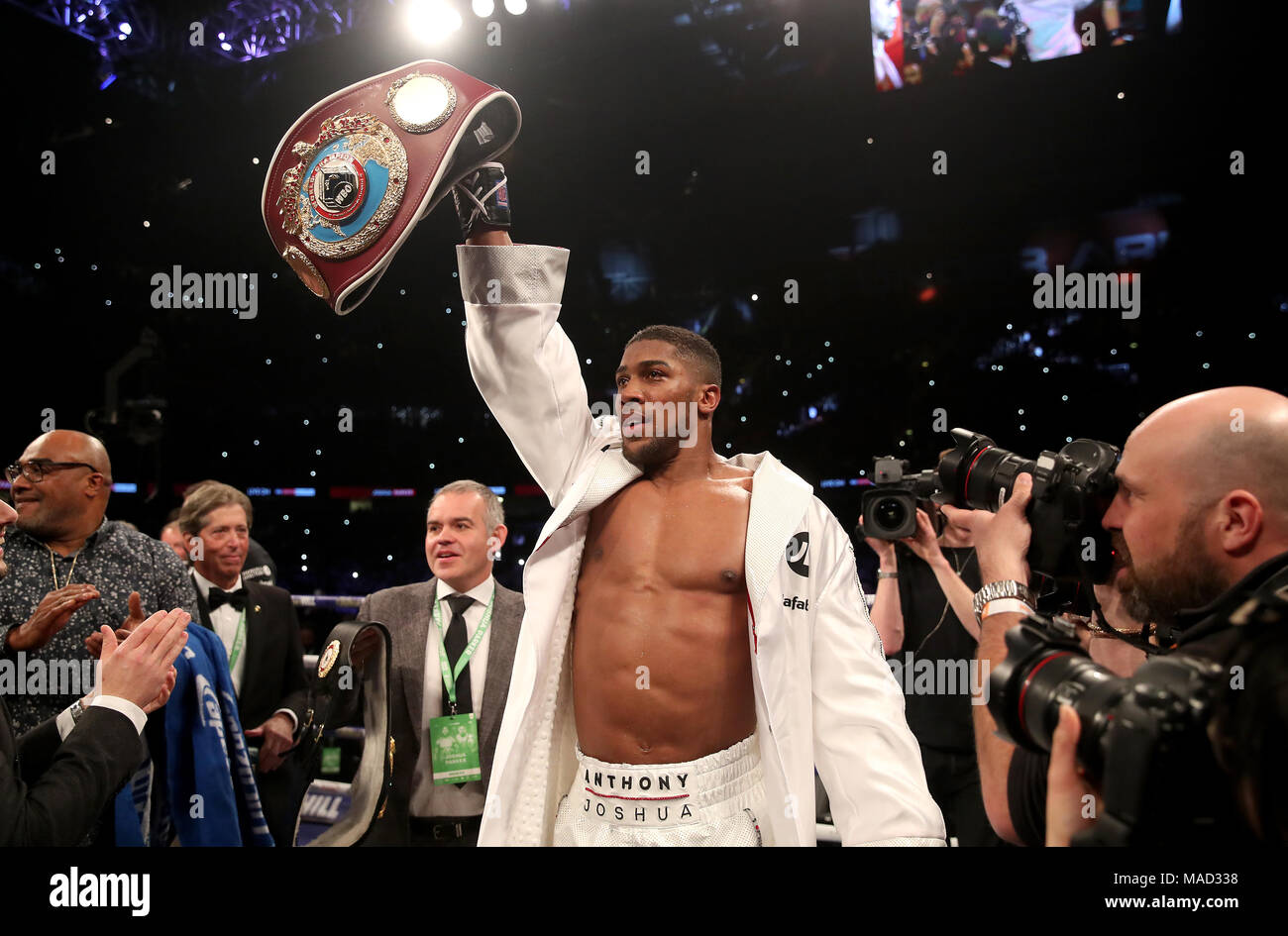 Anthony Joshua celebrates with the WBO Heavyweight belt after victory ...