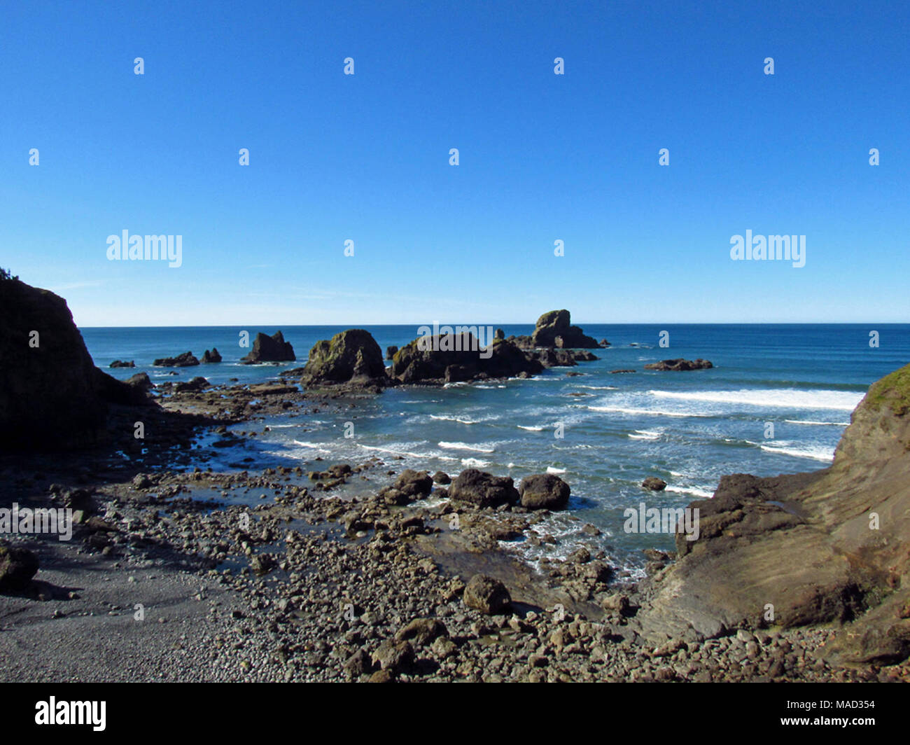 Low Tide at Pacific Coast in OR Stock Photo - Alamy