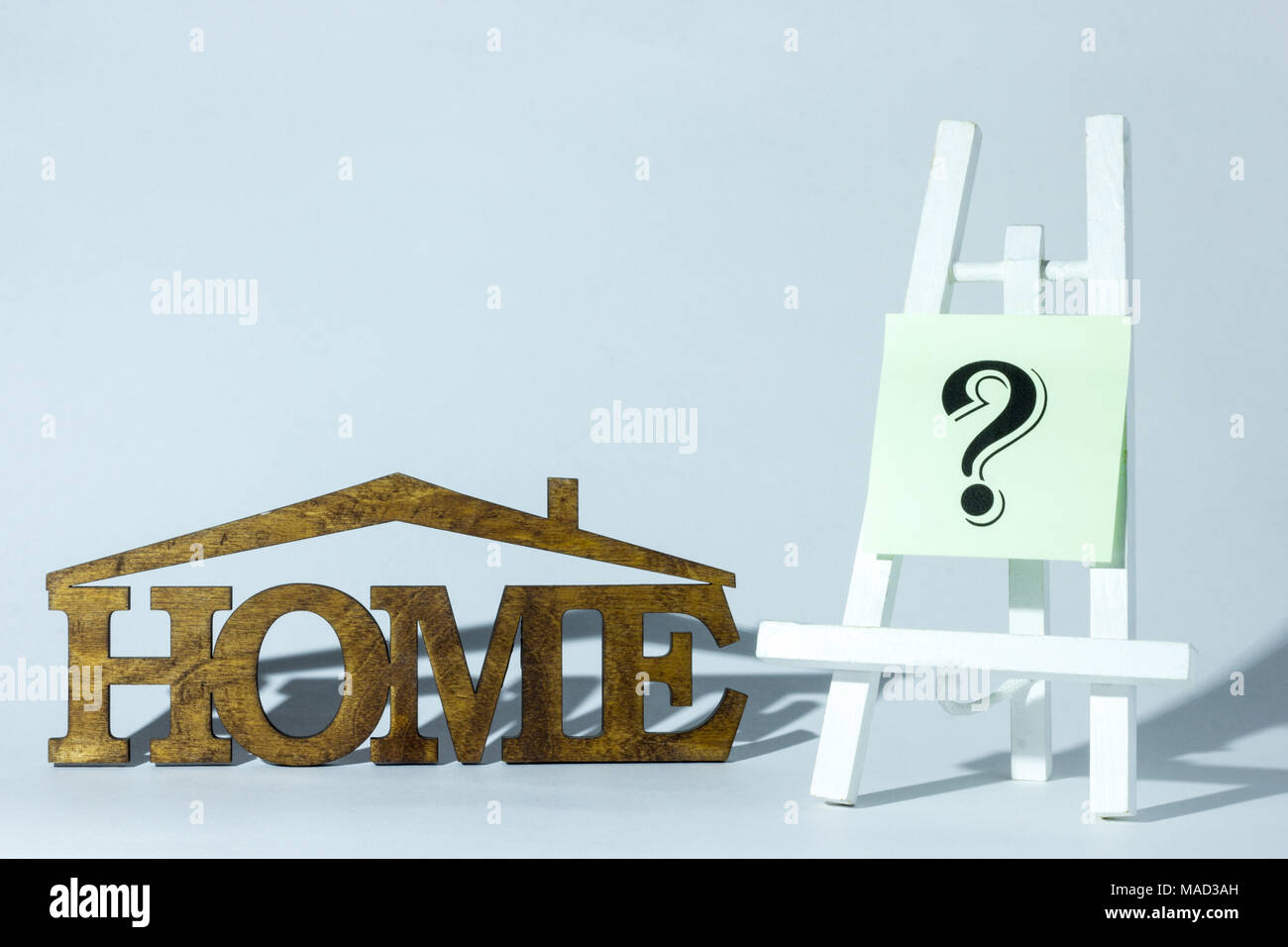 The word "house" is made of wood and an easel with symbols Stock Photo ...