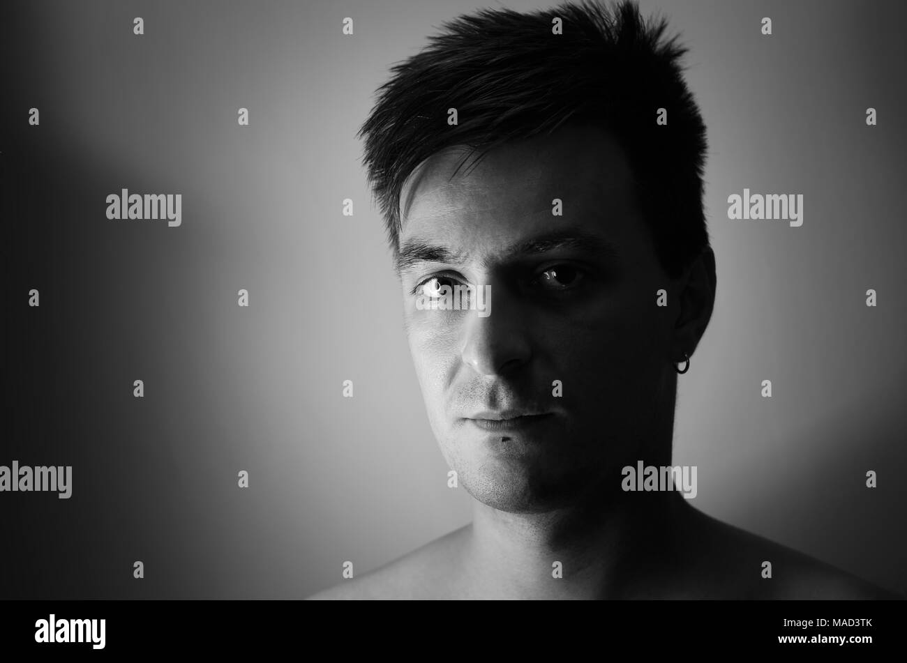 Young man contrast black and white portrait Stock Photo - Alamy