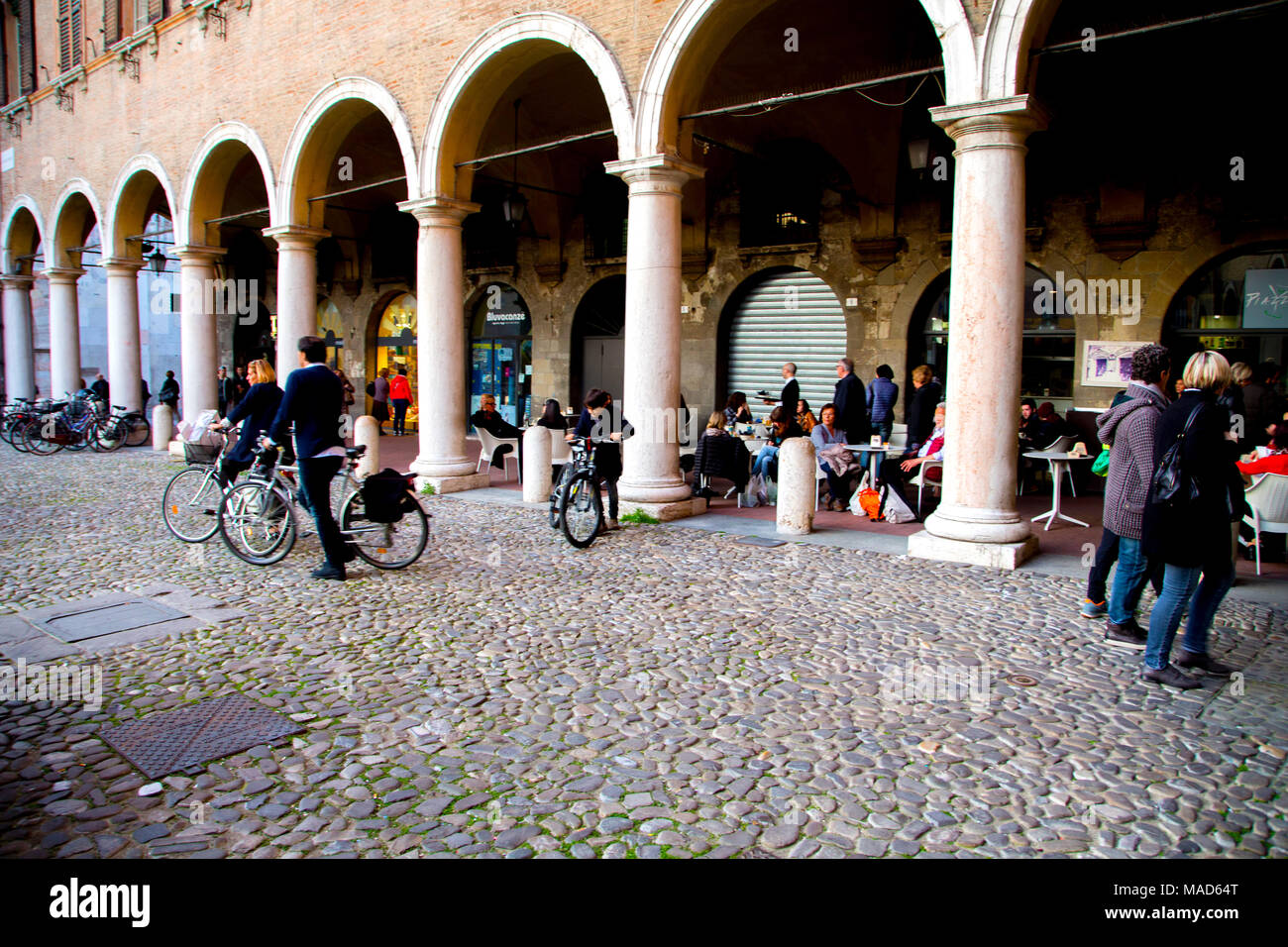 Modena piazza grande cafe cobblestone square people bikes portic hi-res ...