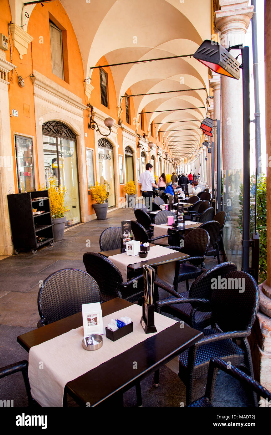 Cafe under covered portico in Modena Italy Stock Photo - Alamy