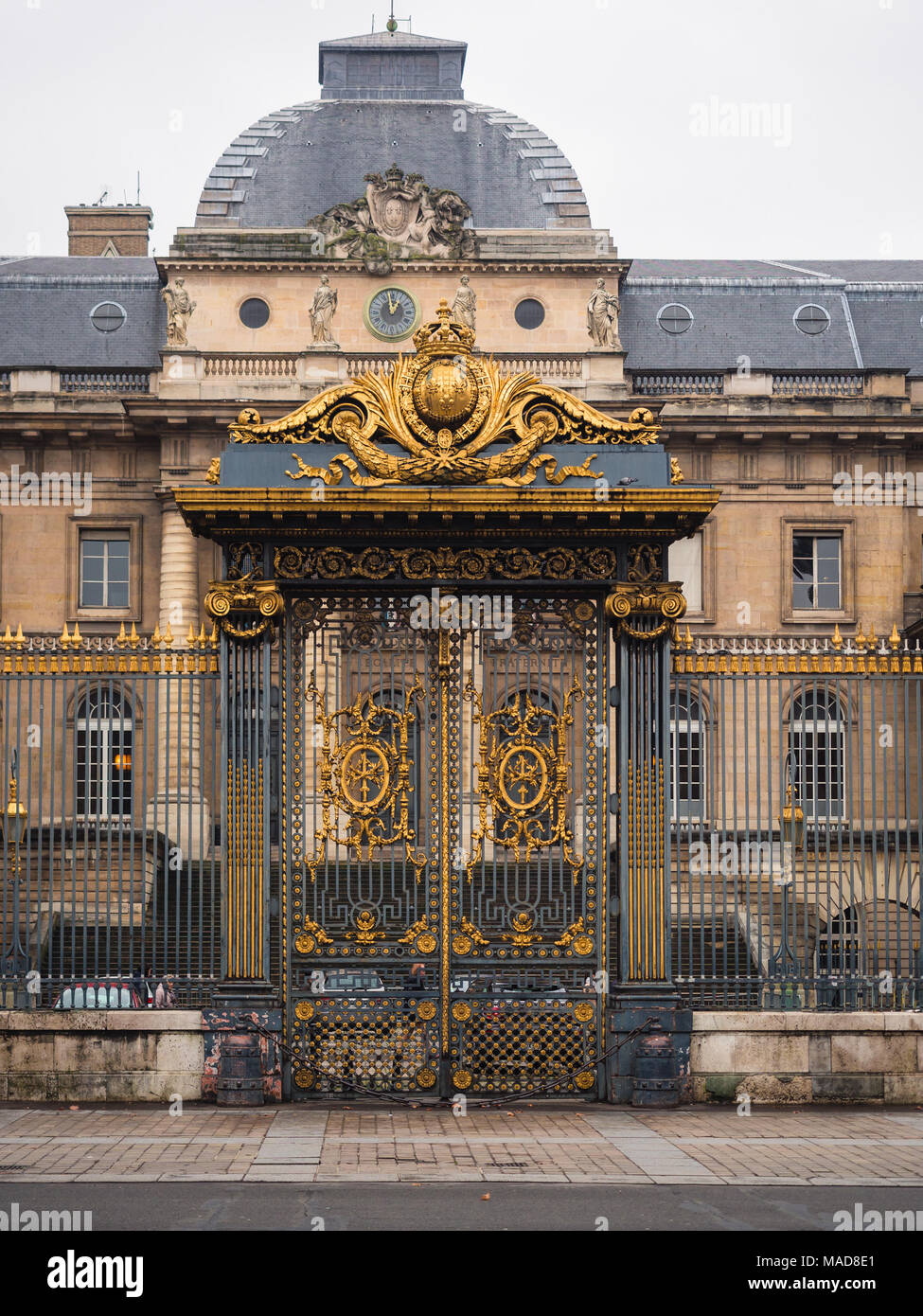 Golden gate of Palace of Justice in the Cite Island in central Paris in ...