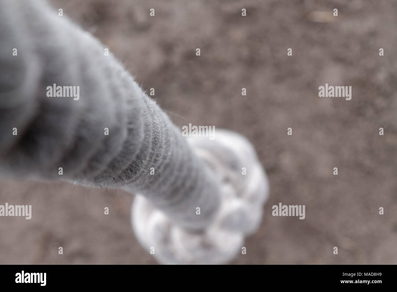 Rope closeup - Thick coiled rope with knot Stock Photo - Alamy