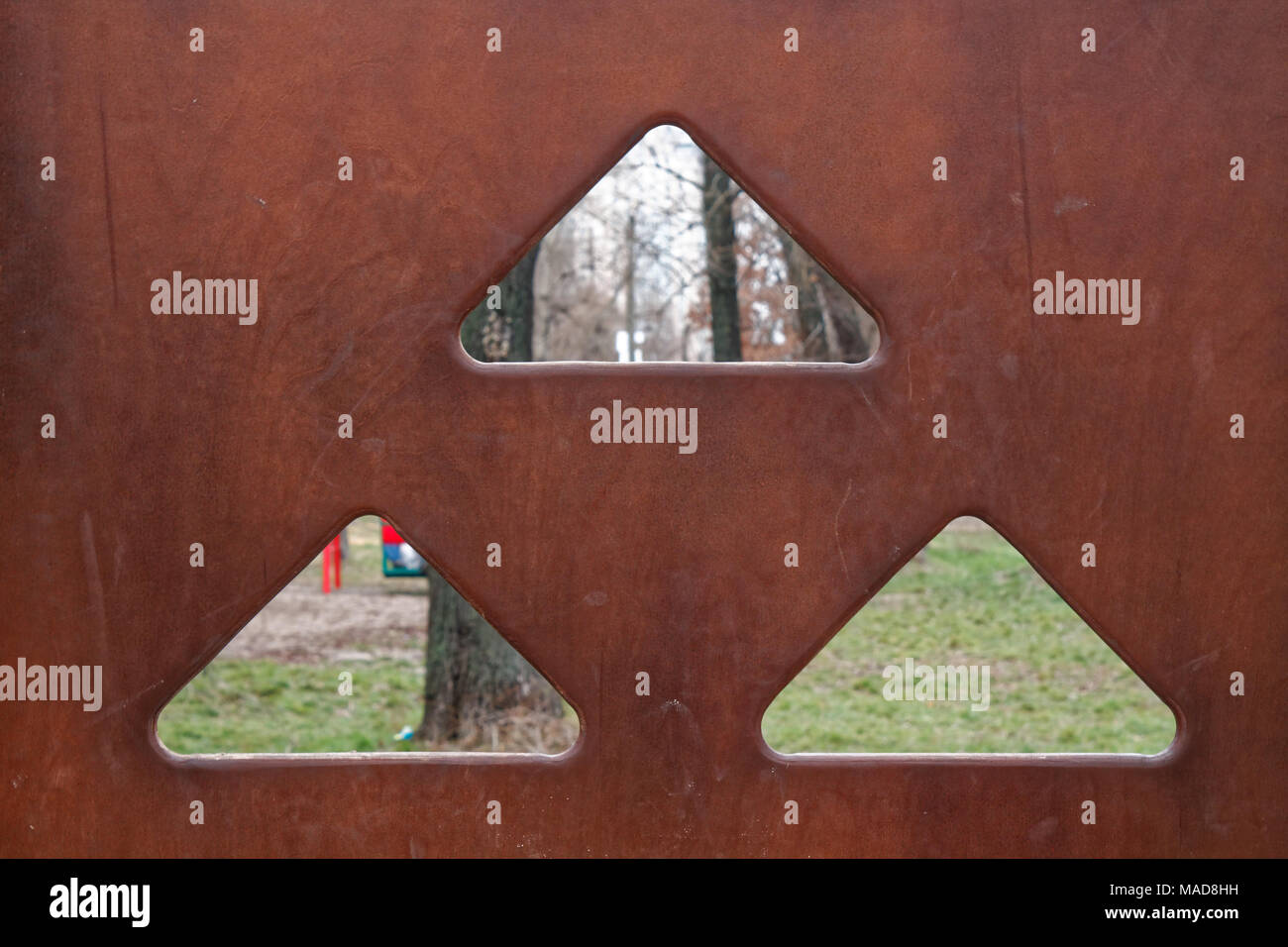 Texture of a wooden surface with hole in triangle shape Stock Photo - Alamy