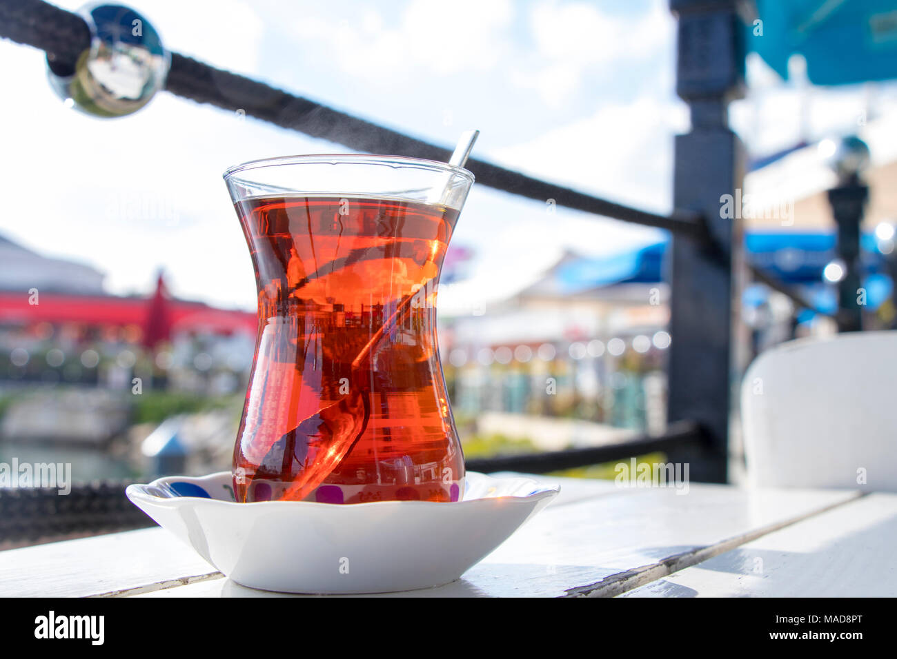 red tea on the light table with real life background Stock Photo - Alamy