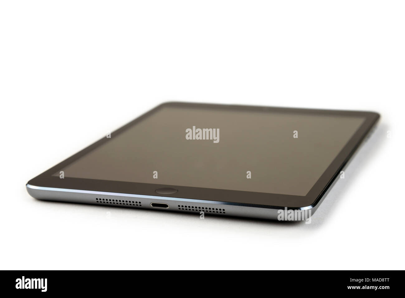Tablet computer on table. Business concept notepad device screen on ...