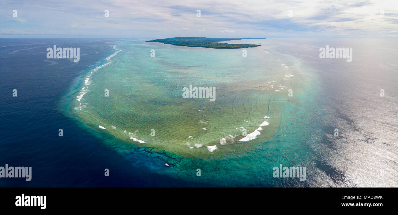 An aerial view of the southern end of the reef surrounding the island ...