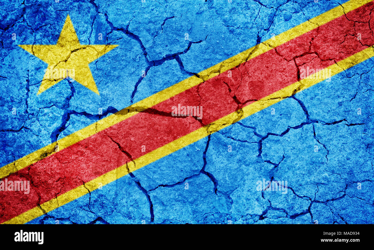 Democratic Republic of the Congo flag on dry earth ground texture ...