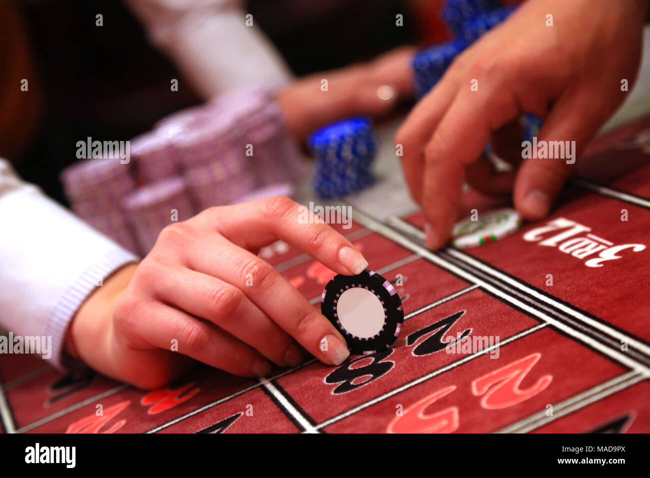 Hand poker player holding one hi-res stock photography and images - Alamy