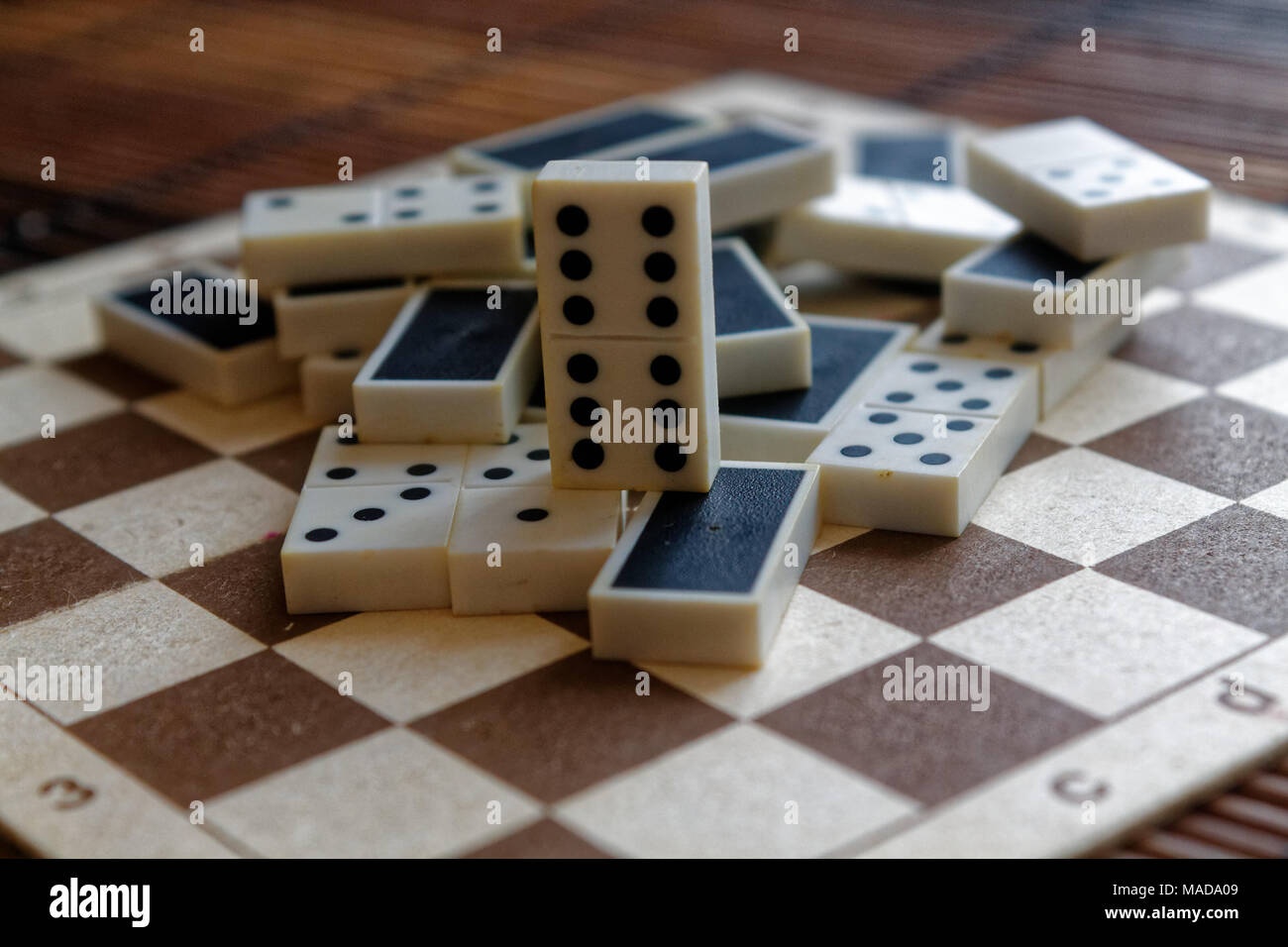 Pile domino tiles hi-res stock photography and images - Alamy
