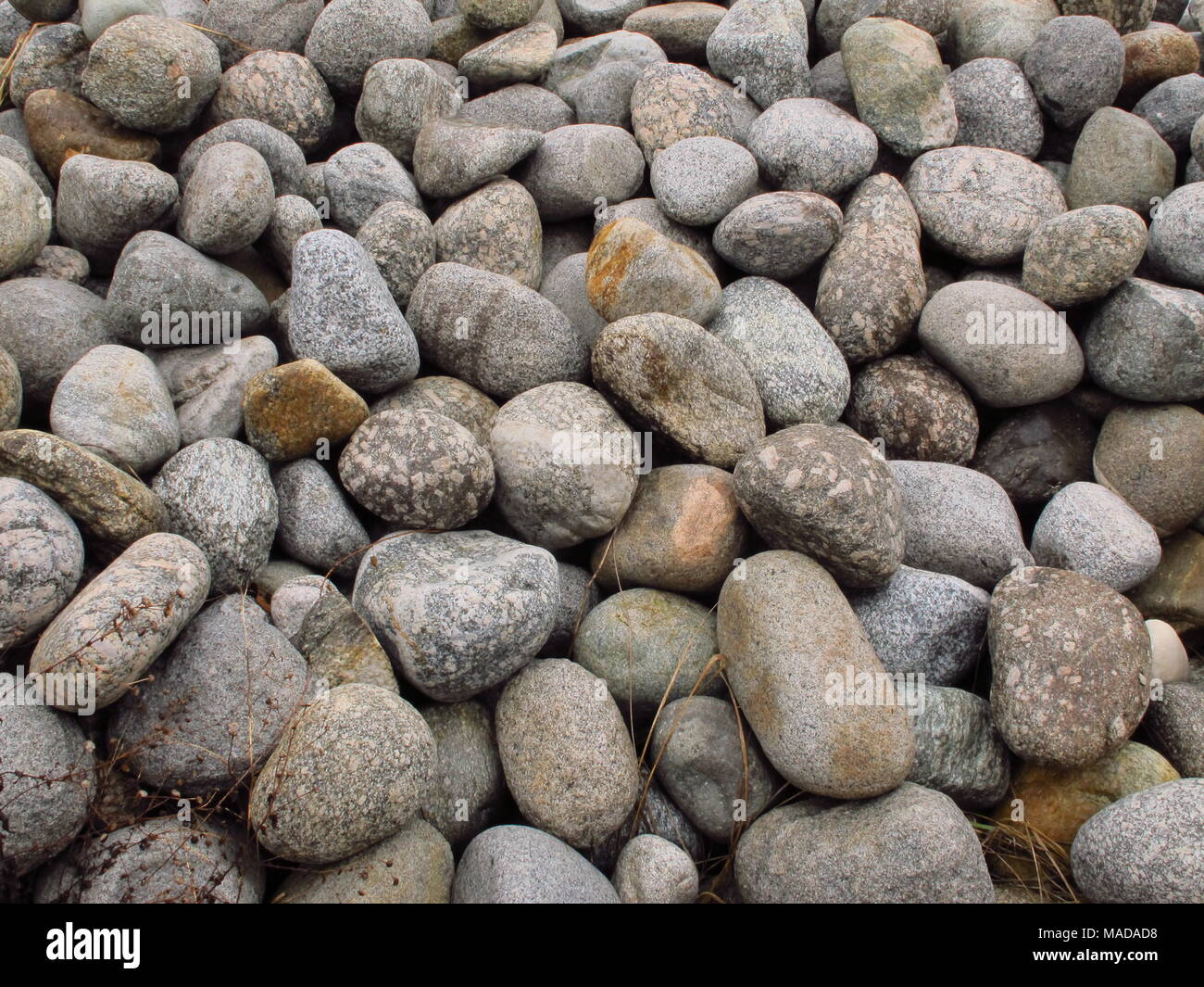 Small stones background Stock Photo - Alamy
