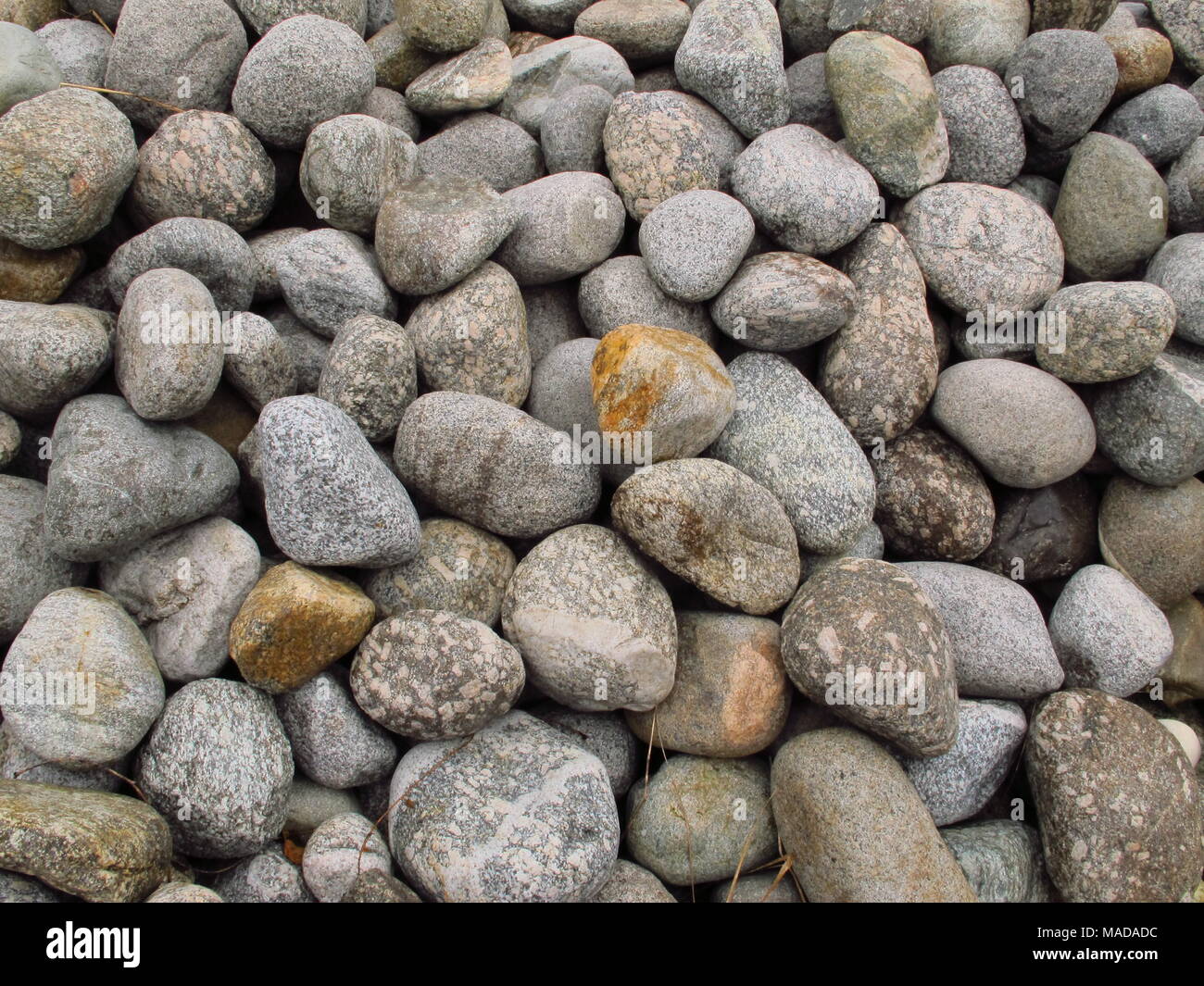 Small stones background Stock Photo - Alamy
