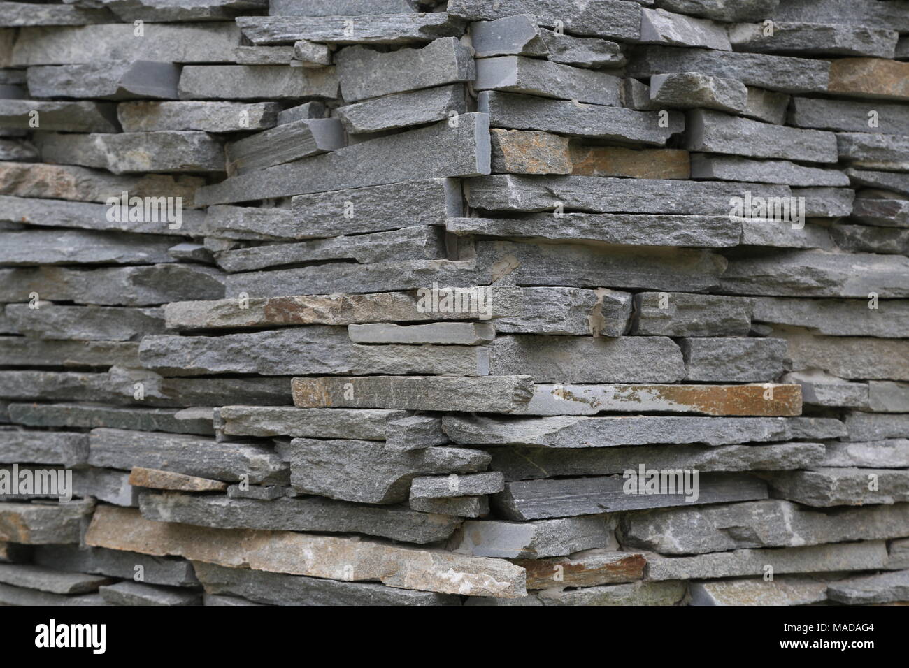 Stacked horizontal gray stone plates Stock Photo - Alamy