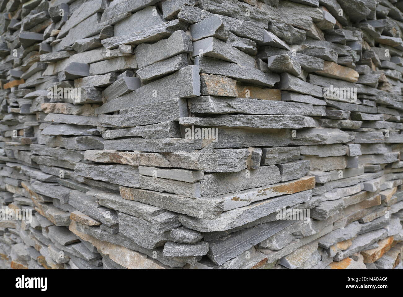 Stacked horizontal gray stone plates Stock Photo - Alamy