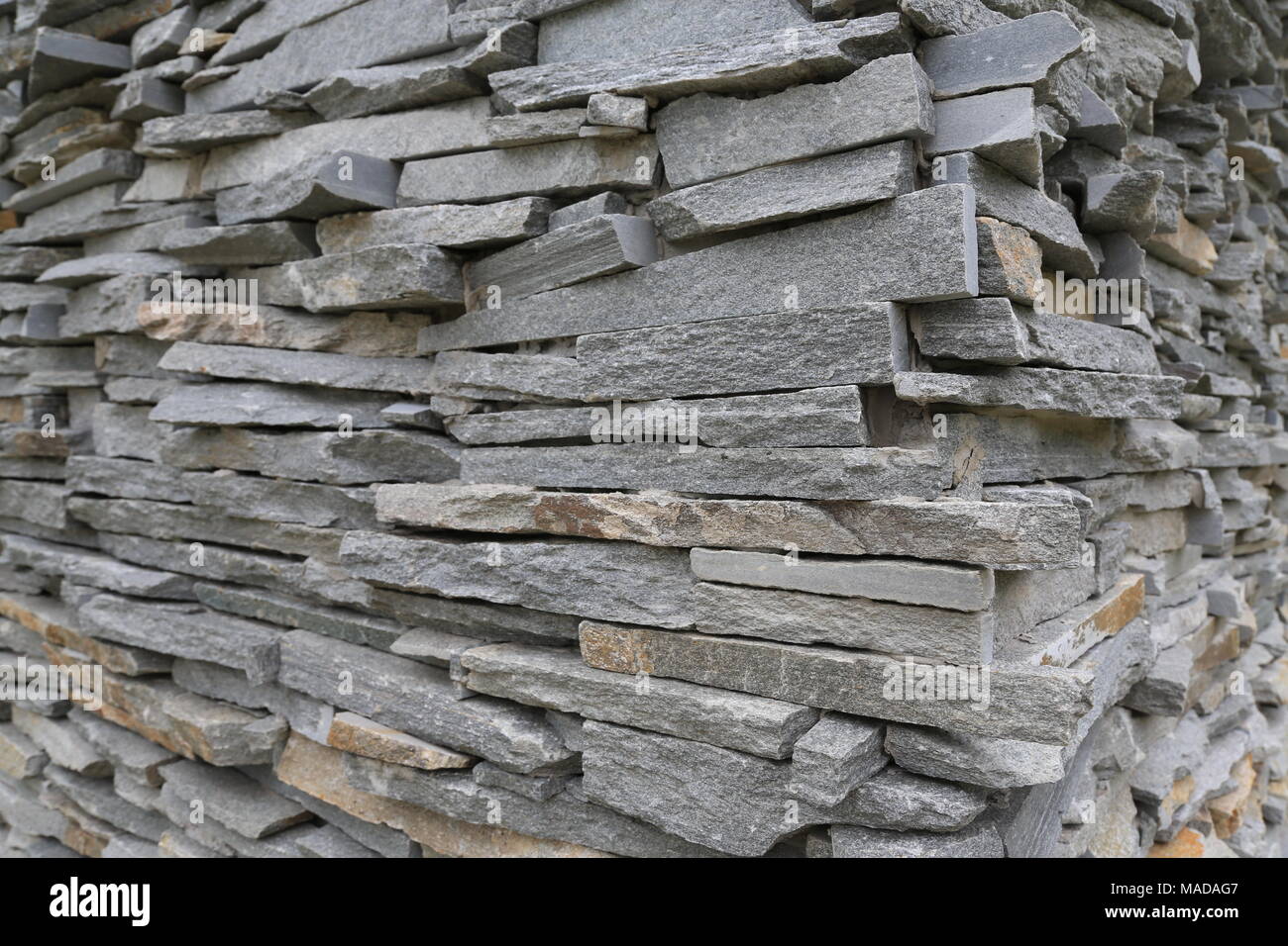 Stacked horizontal gray stone plates Stock Photo - Alamy