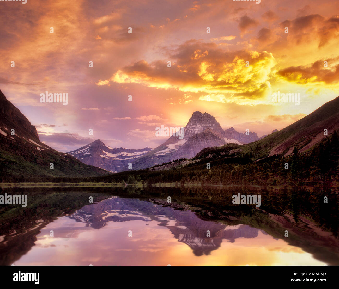 Sunset on Swiftcurrent Lake with Mount Wilbur. Glacier National Park ...