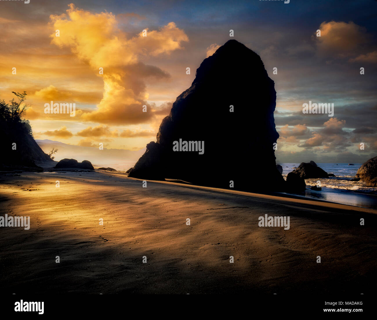 Morning fog at beach in Port Orgord, Oregon Stock Photo - Alamy