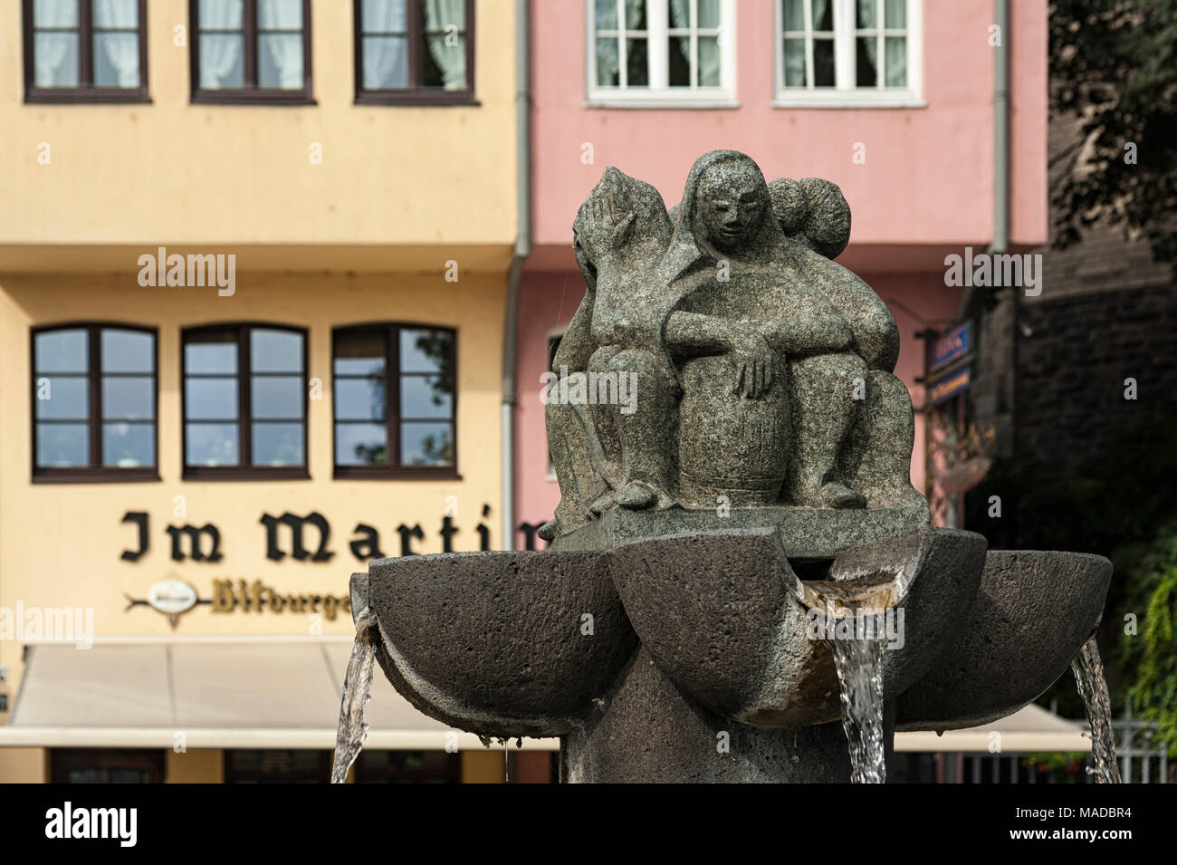 Fountain near the colorful German historical houses in Bavarian style ...