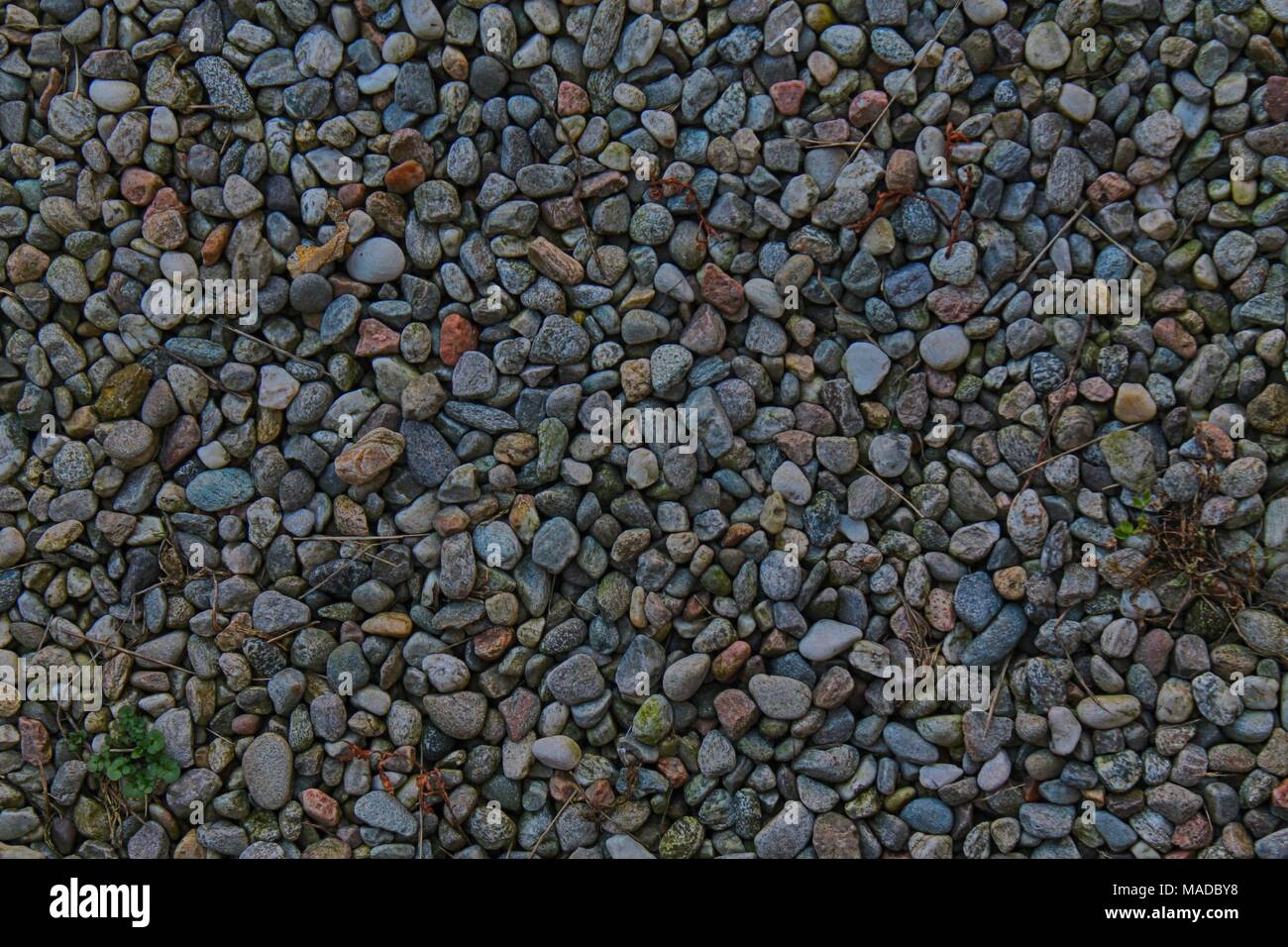 Nice background image of pebbles, round rocks texture Stock Photo - Alamy
