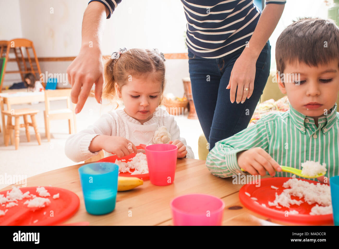 Time to eat in kindergarten Stock Photo - Alamy
