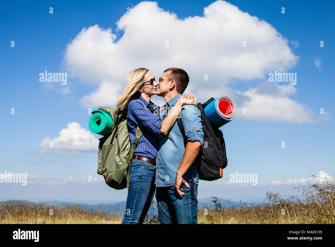 Romantic kiss while traveling Stock Photo - Alamy